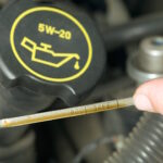 How to Read an Oil Dipstick (and Where to Find Yours)
